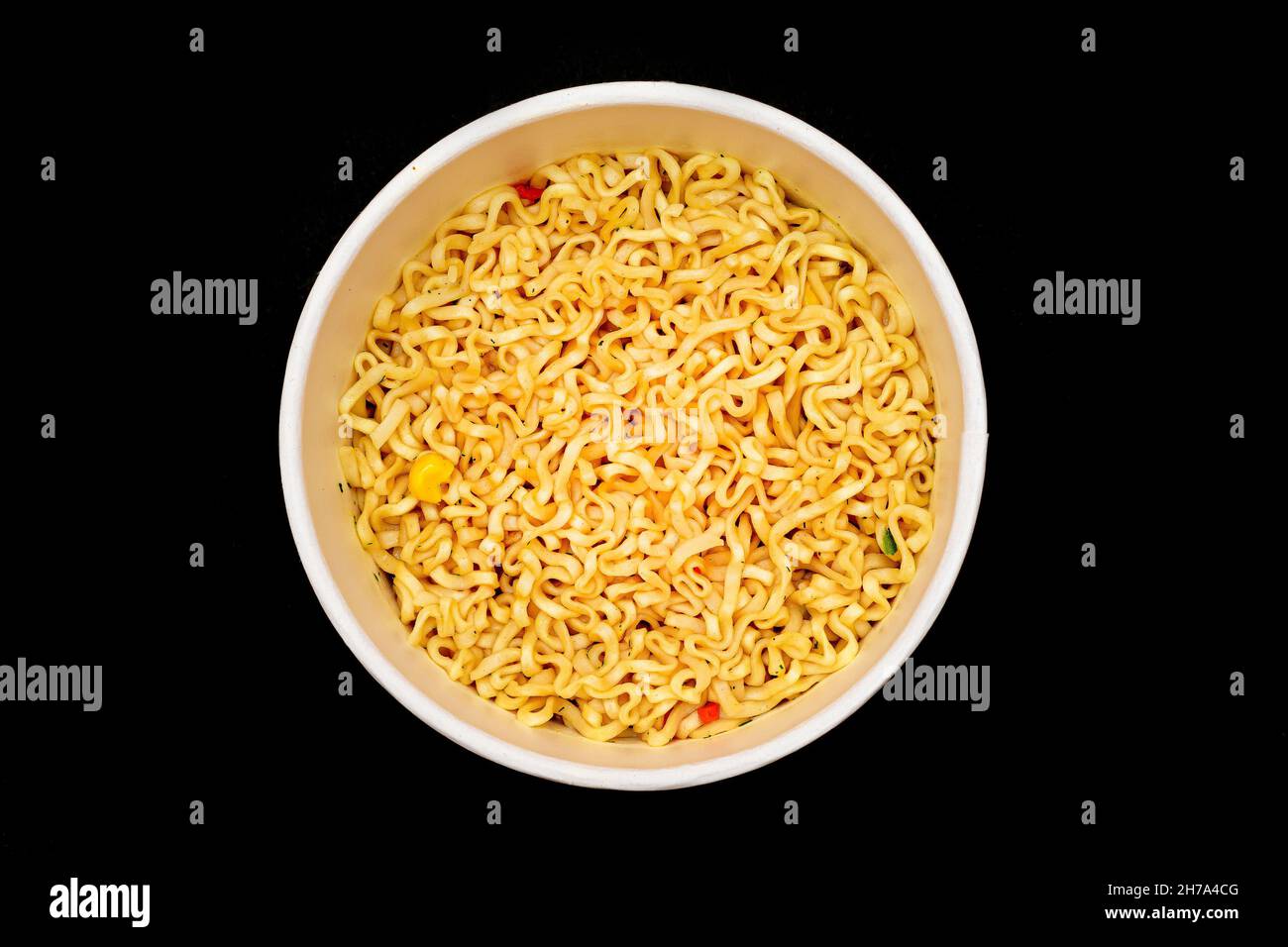 Instant Noodles in Disposable Cup on Black Background - Top View. Asian ...