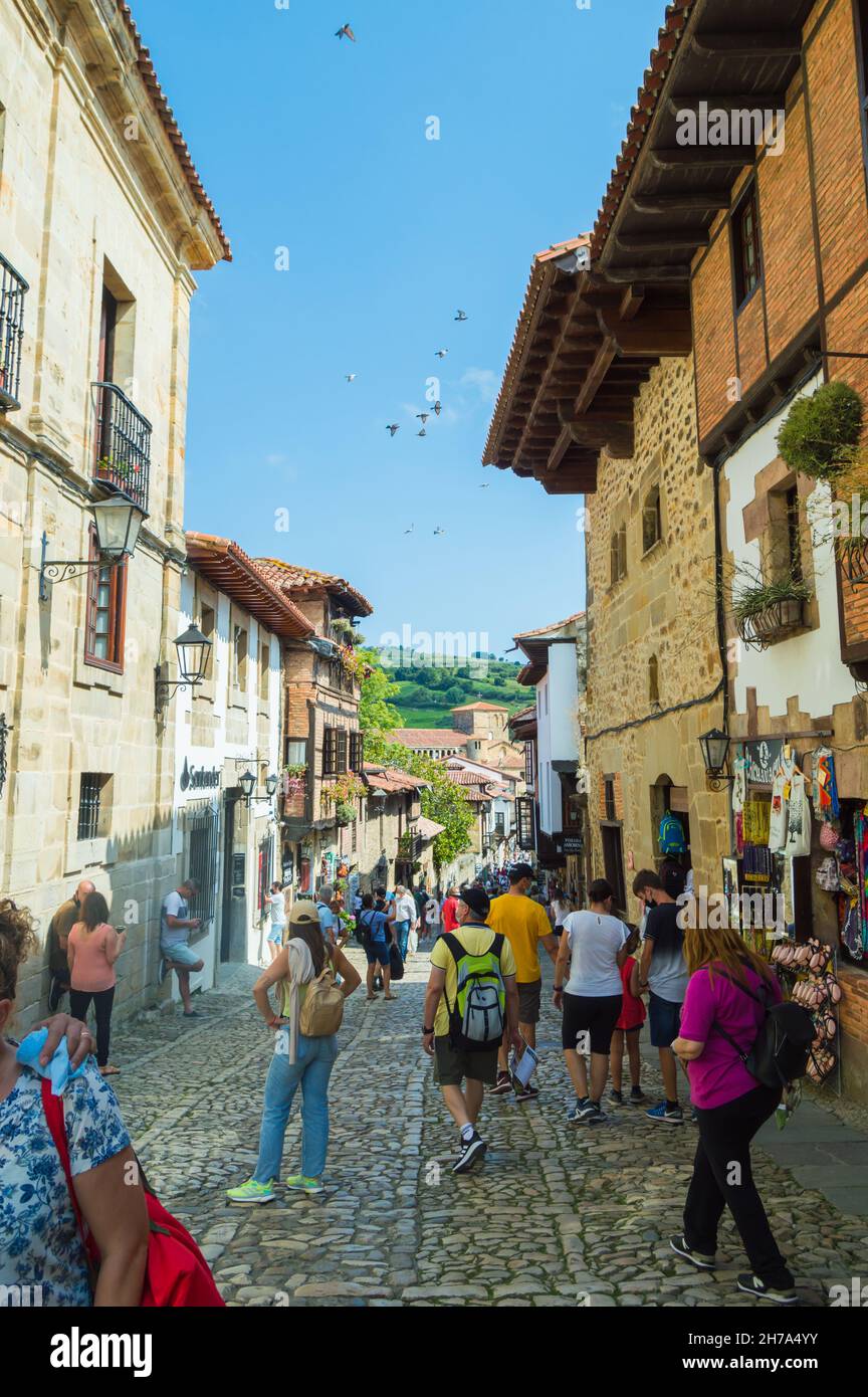 SANTILLANA DEL MAR, SPAIN - Aug 24, 2021: The main street full of ...