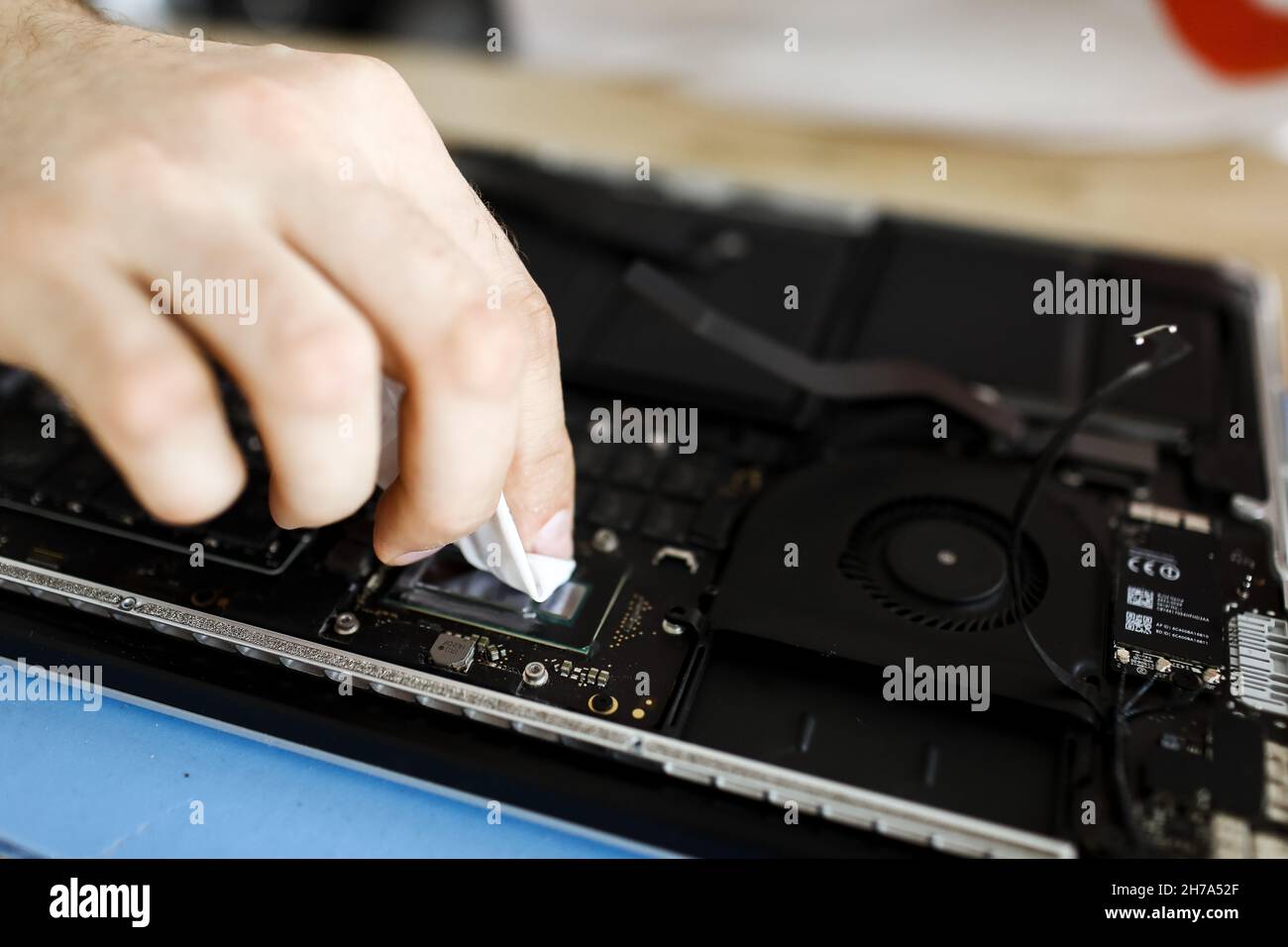Computer repair concept Close-up view.Hardware. clearing notebook Stock ...