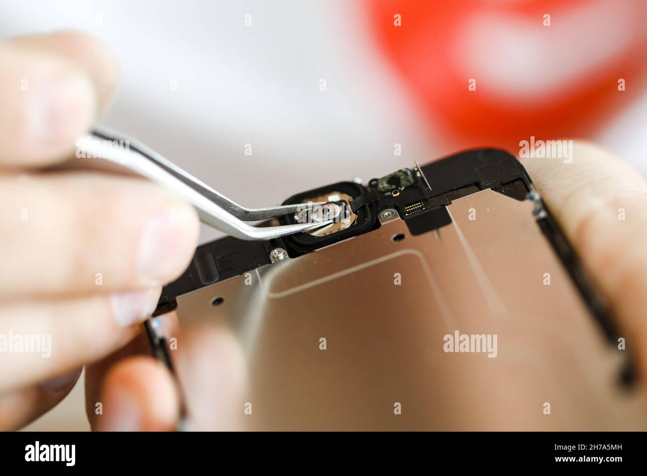 Close-up photos showing process of mobile phone repair Stock Photo - Alamy