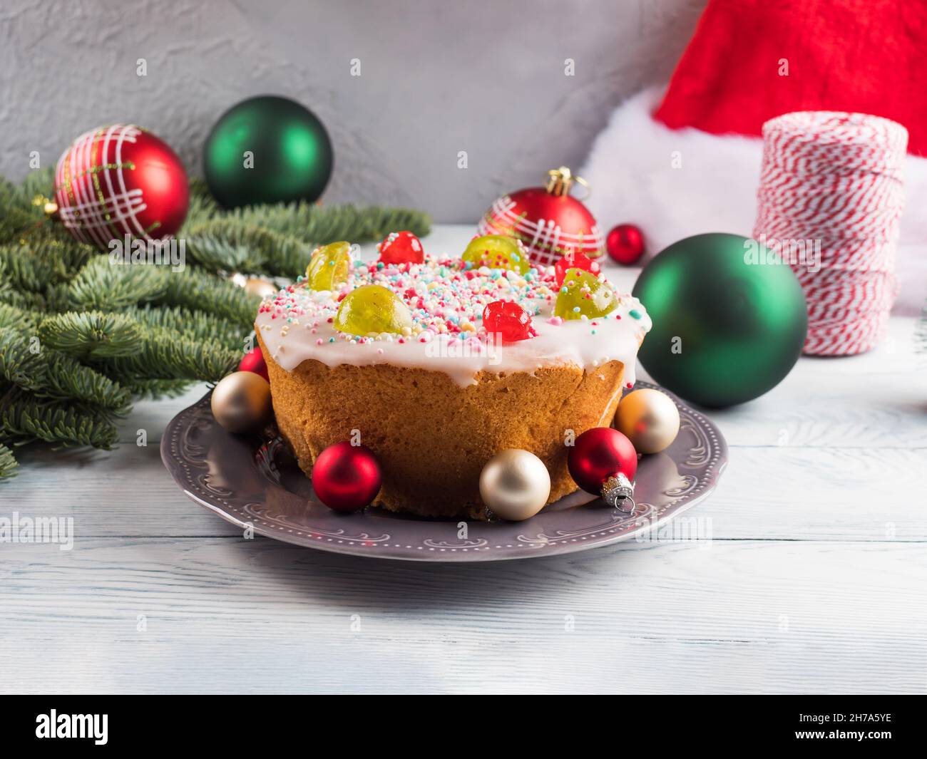 Sweet christmas cake with xmas decor and lights Stock Photo - Alamy