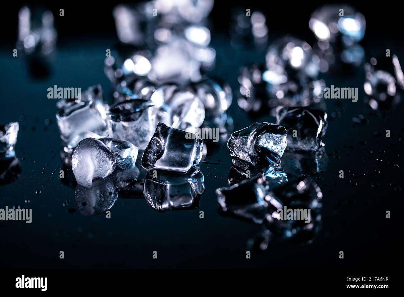 ice cubes reflection on black background. close up Stock Photo - Alamy