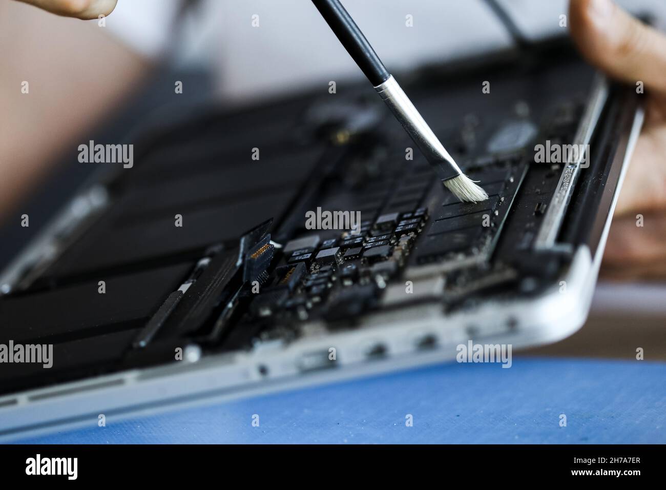 Computer repair concept Close-up view.Hardware. clearing notebook Stock ...
