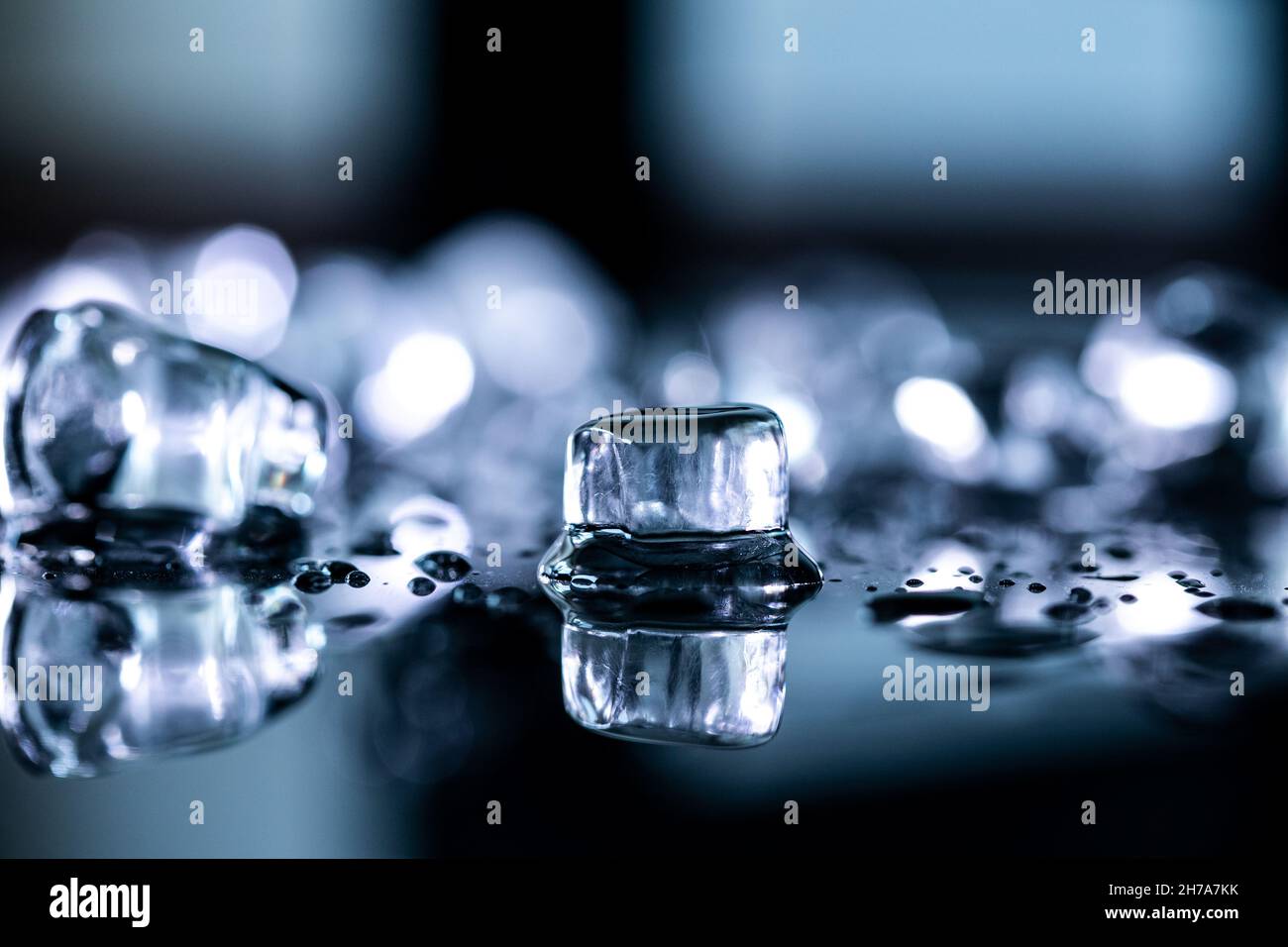 ice cubes reflection on black background. close up Stock Photo - Alamy