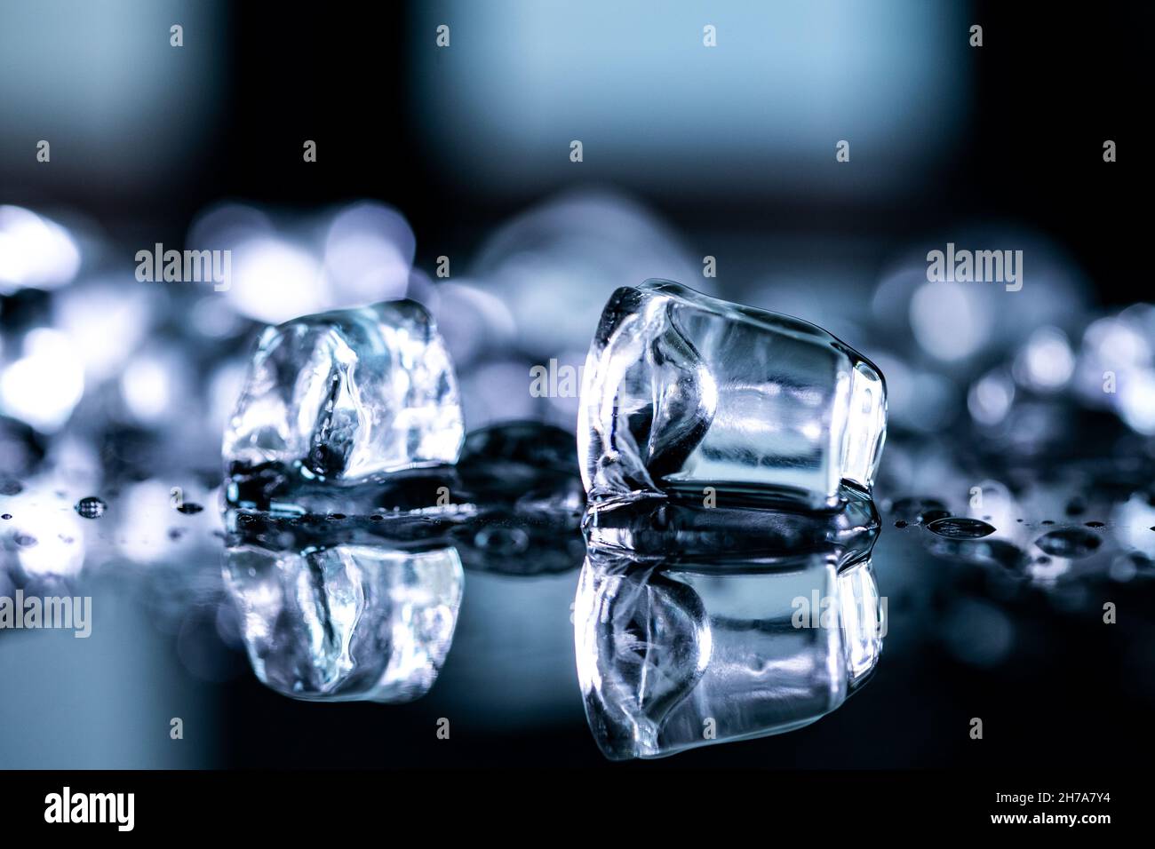 ice cubes reflection on black background. close up Stock Photo - Alamy