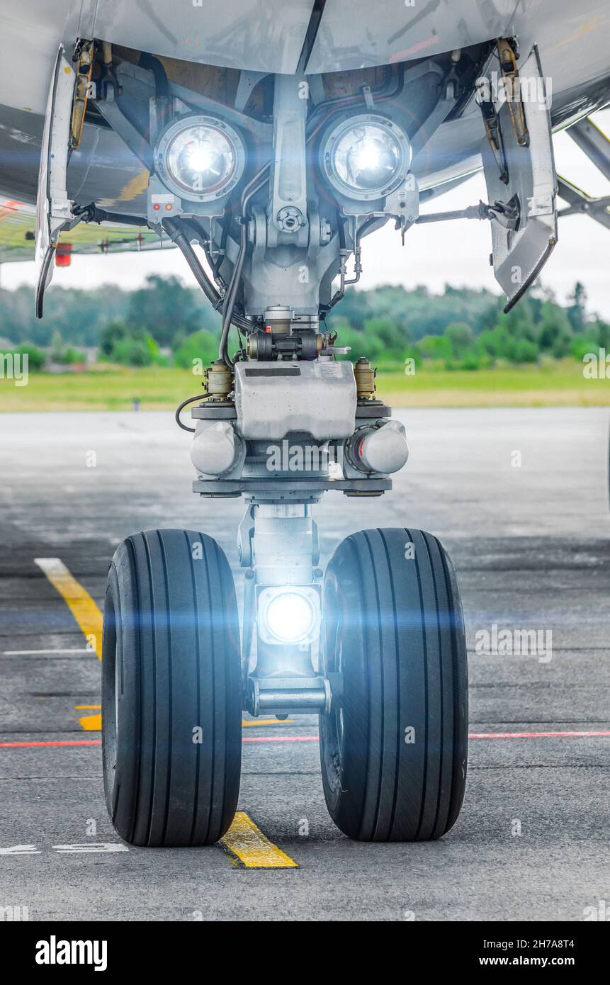 Aircraft landing gear and landing lights lights on Stock Photo - Alamy