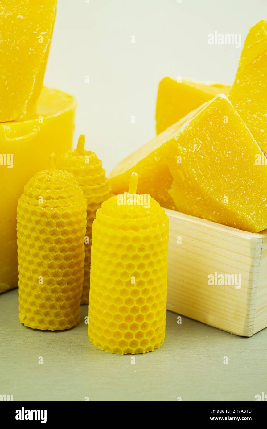large pieces of natural beeswax, close-up, raw materials for candles ...