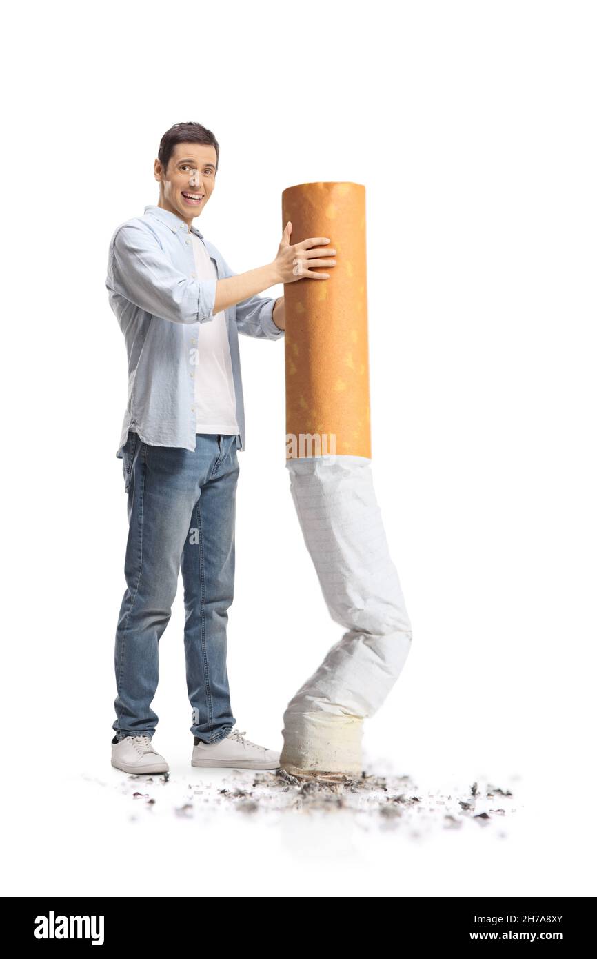 Happy man for quitting smoking and putting off a big cigarette isolated ...