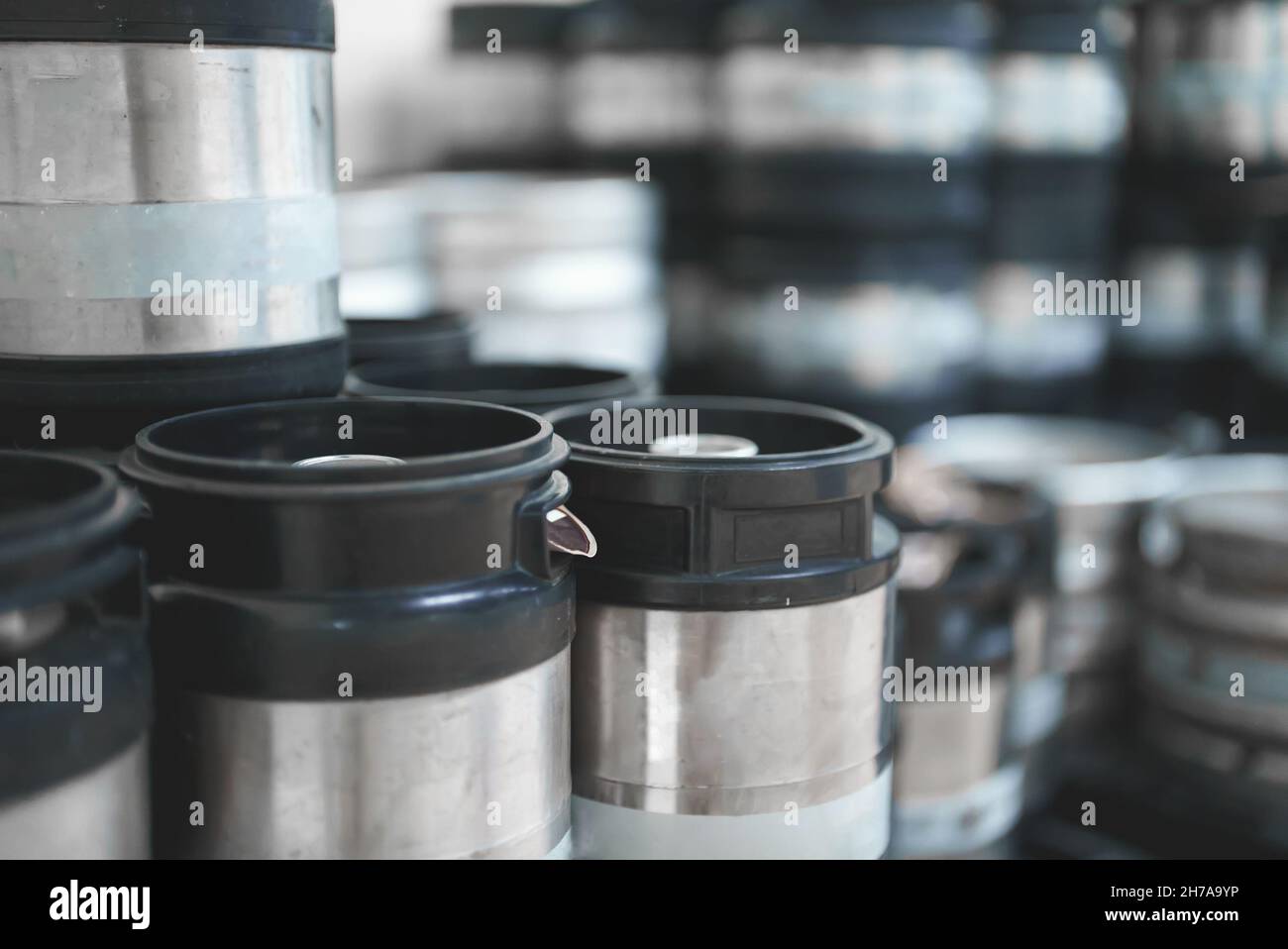 Many metal beer kegs in storage Stock Photo - Alamy