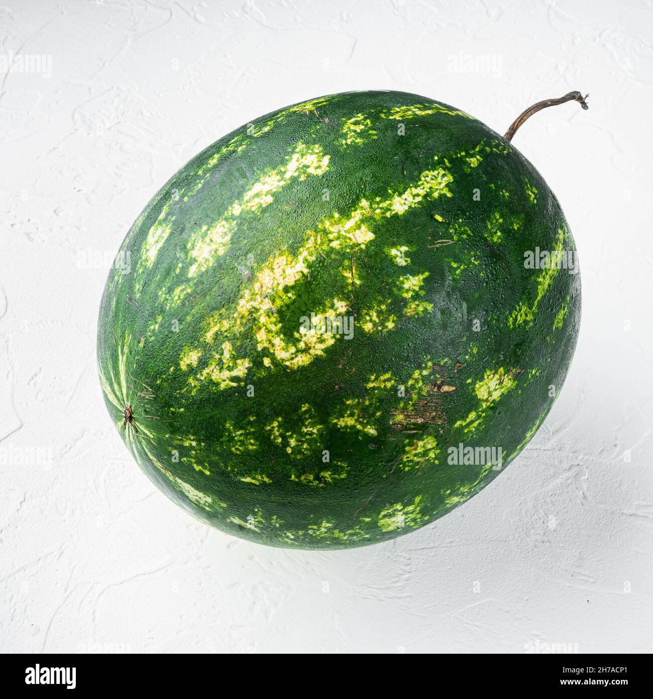 Ripe single full watermelon berry set, on white stone table background ...