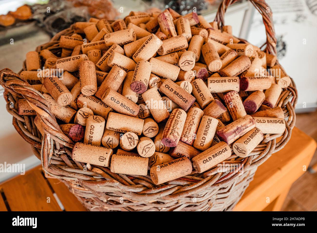 29 May 2021, Yehegnadzor, Armenia: Many wine corks with Old Bridge ...