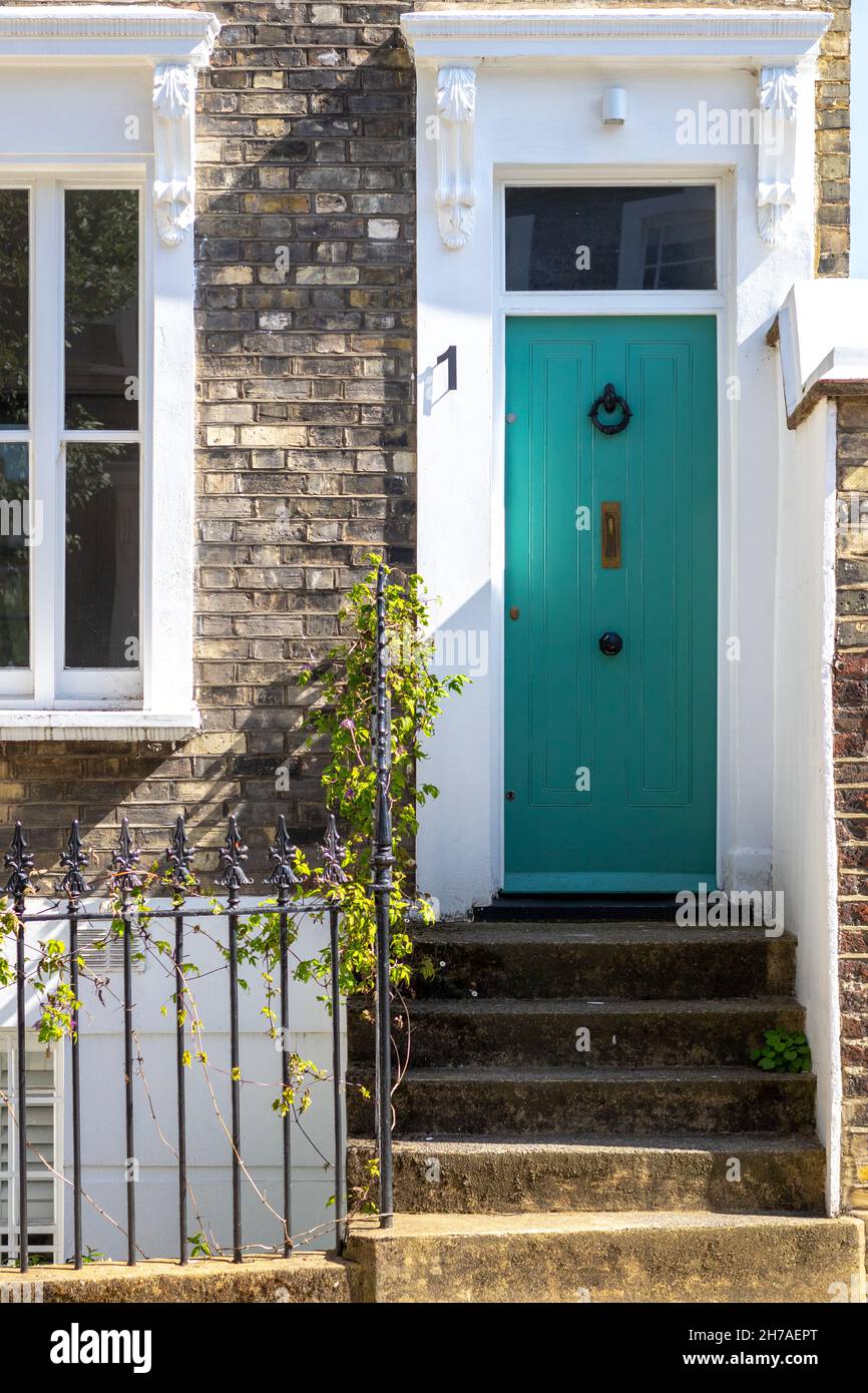 Traditional British front door in green with the number 1 Stock Photo ...