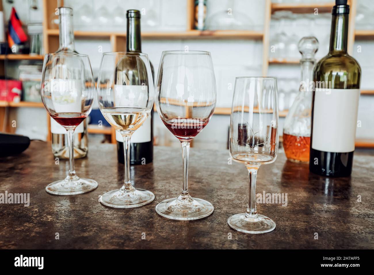 Wine tasting before buying in a specialty store at the winery. Concept ...