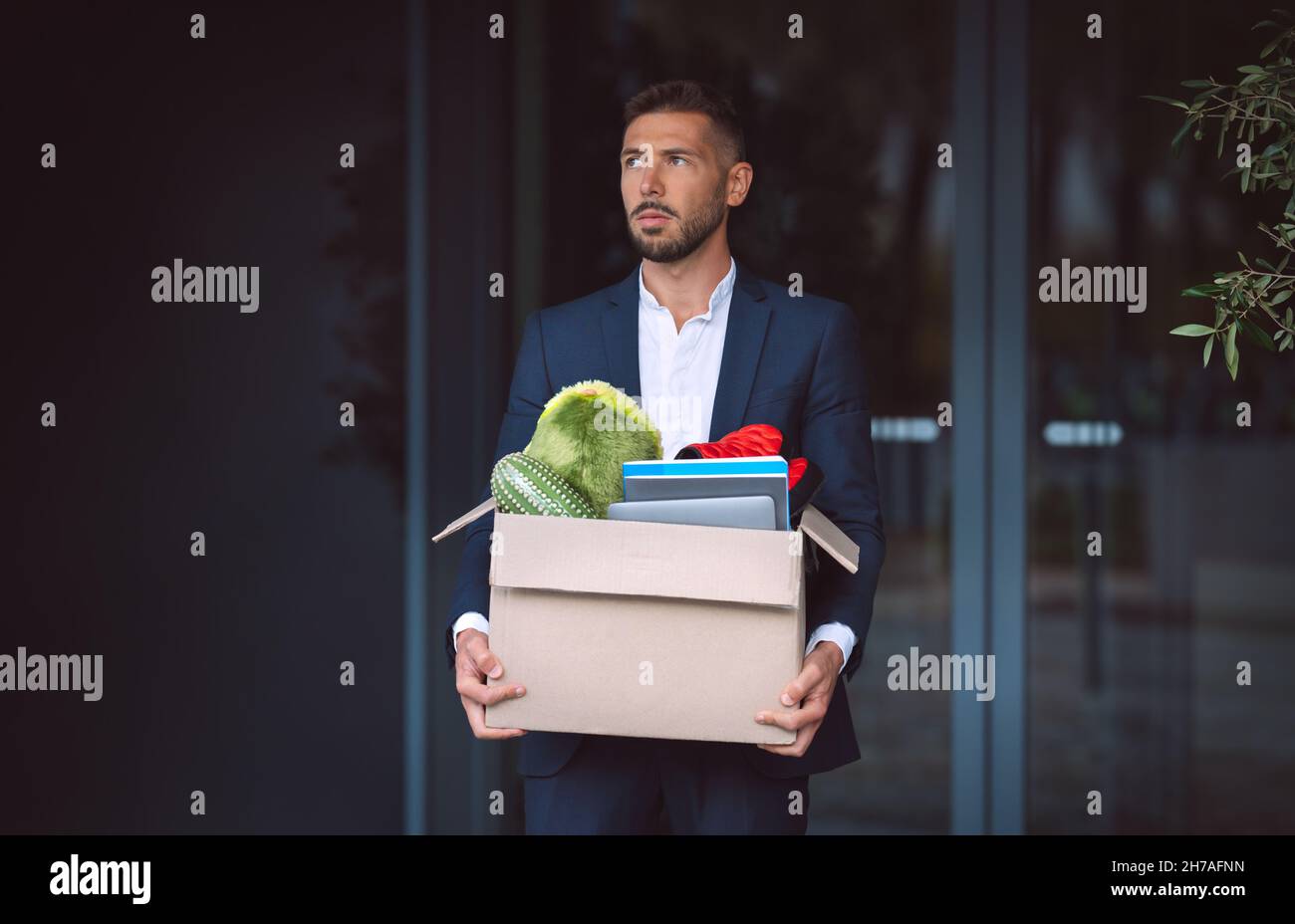 Upset man got fired from an office job. Office worker lost his job ...