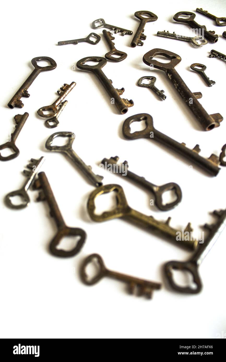 The old keys isolated on white background Stock Photo - Alamy