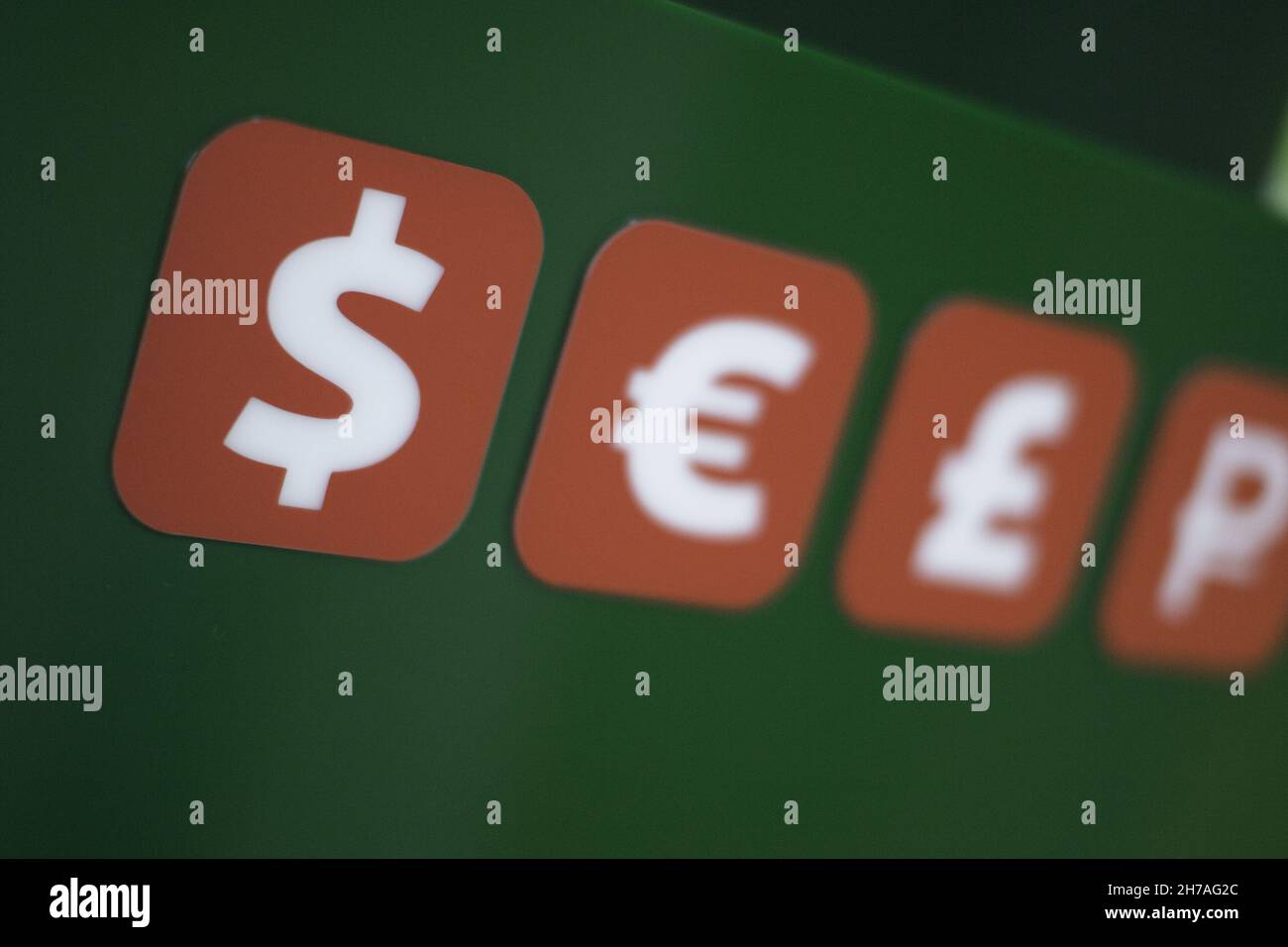 A row of international currency symbol stickers on a glass window Stock ...