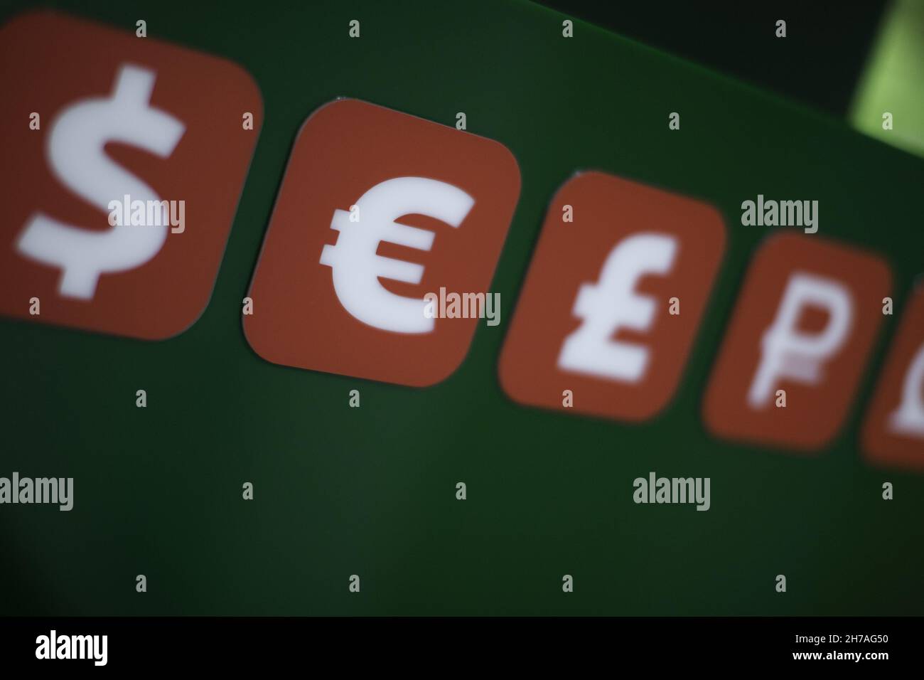 A row of international currency symbol stickers on a glass window Stock ...