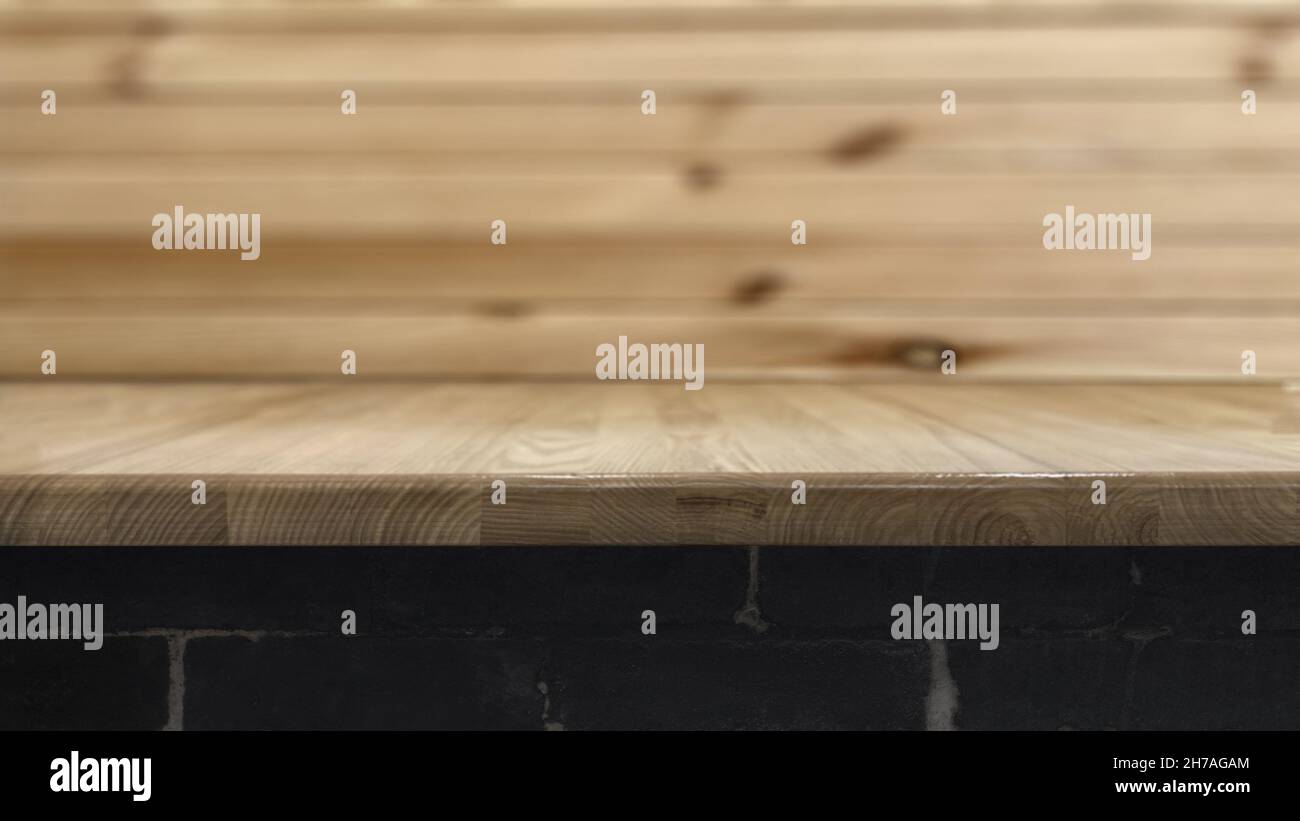 Wooden desk near wall with back brick base. Rustic vintage workspace ...