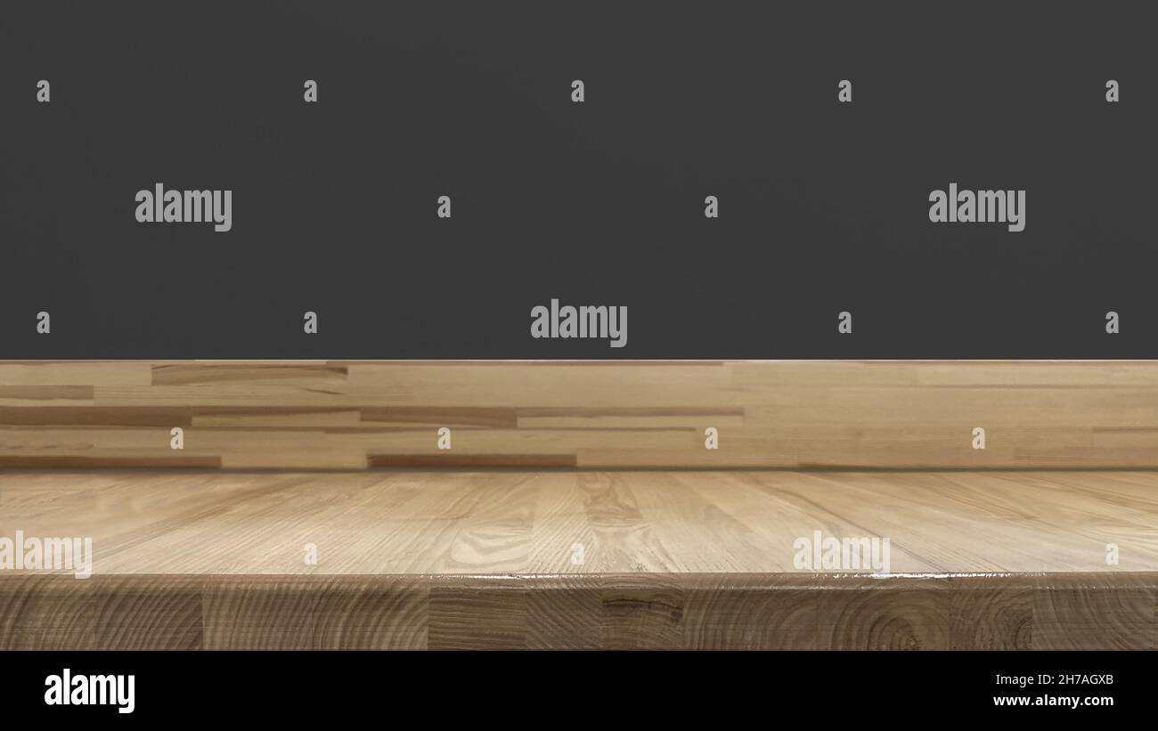 Vintage table on dark black wall background Stock Photo - Alamy