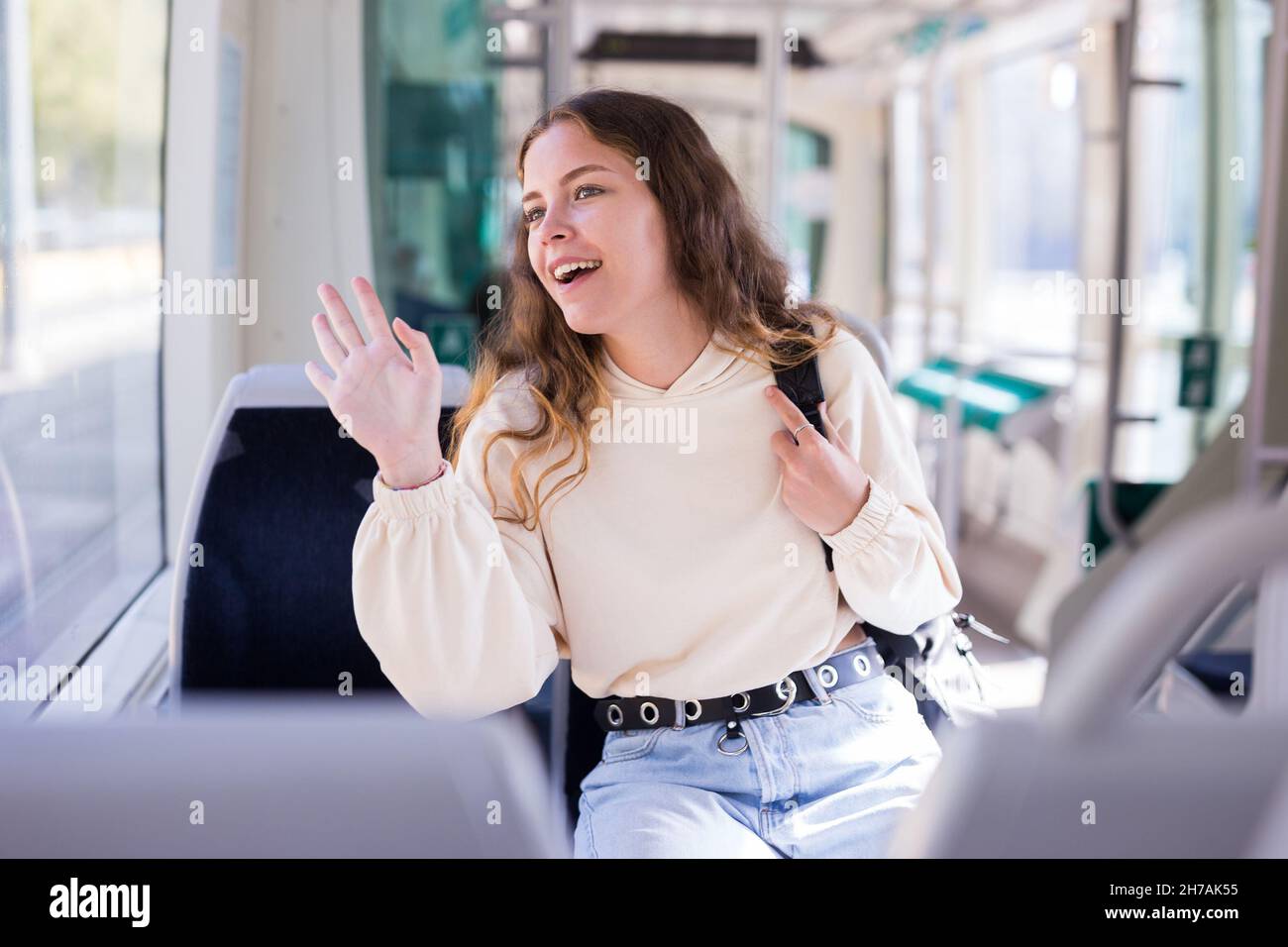 Woman waving bus hi-res stock photography and images - Alamy