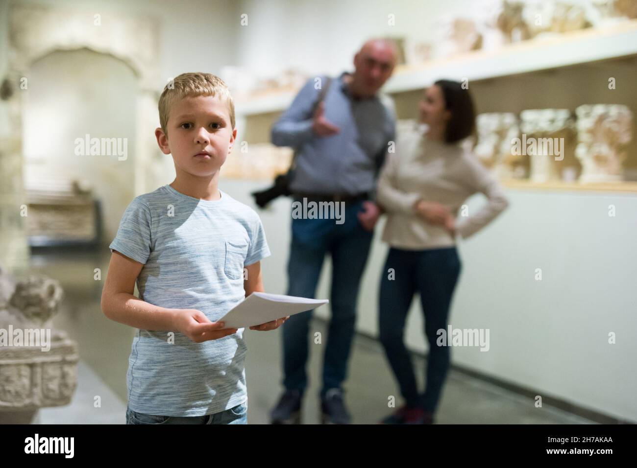 Family visiting museum Stock Photo - Alamy