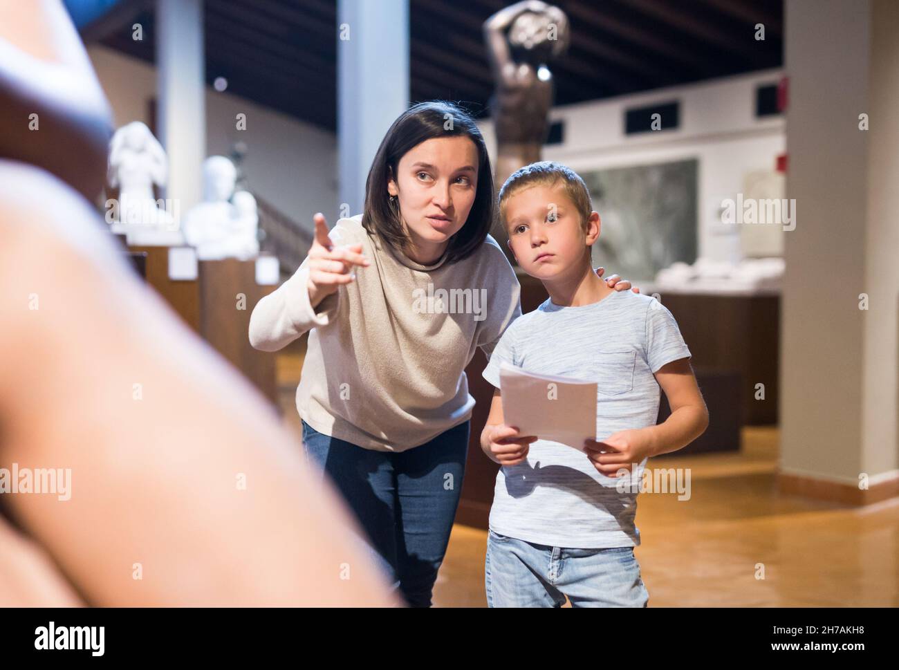 Family visiting historical museum Stock Photo - Alamy