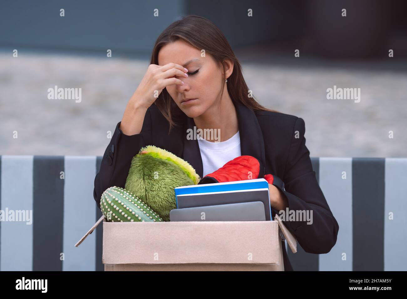 Upset woman got fired from an office job. Dismissal from work or job ...