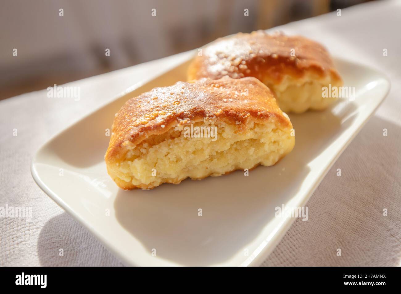 Delicious and sweet pastries on a plate with morning light from the ...