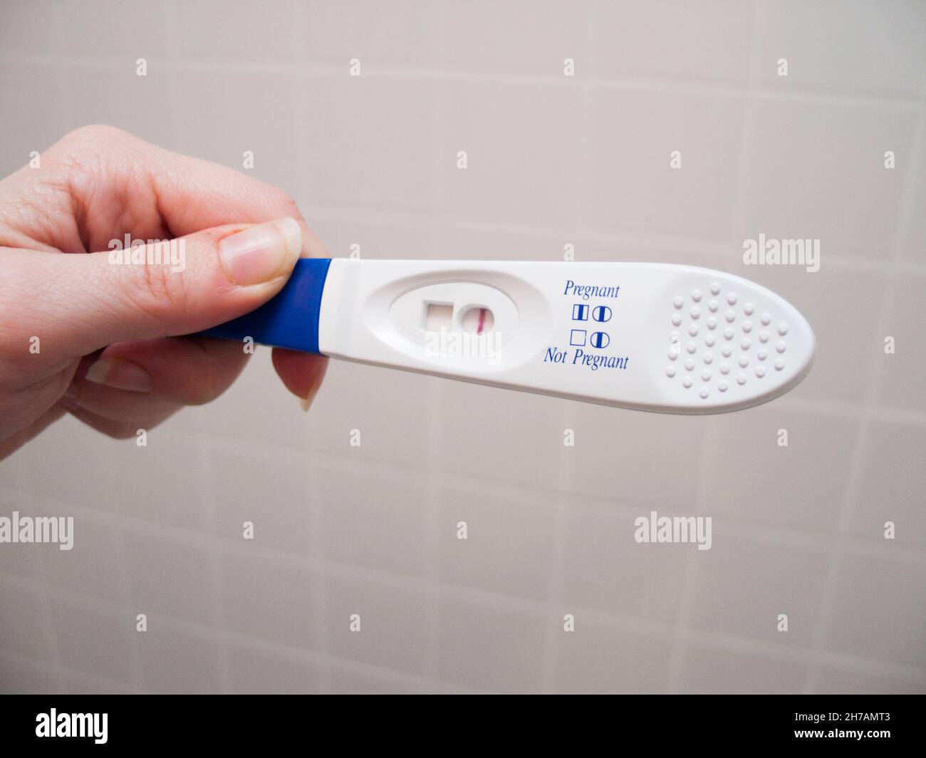 Negative home pregnancy test Stock Photo - Alamy