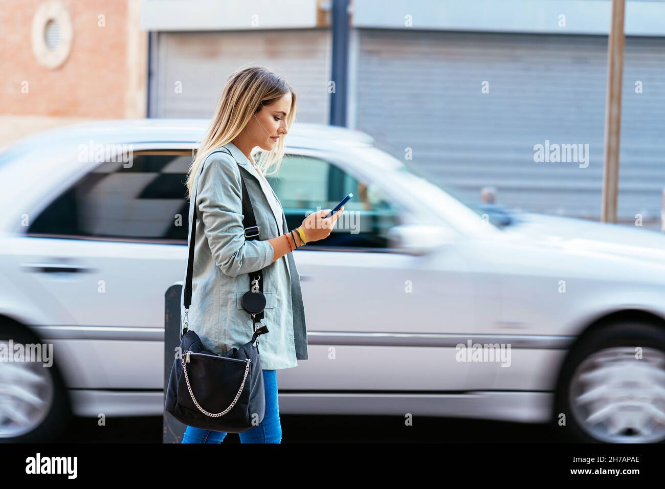 Woman browsing on smartphone hi-res stock photography and images - Alamy