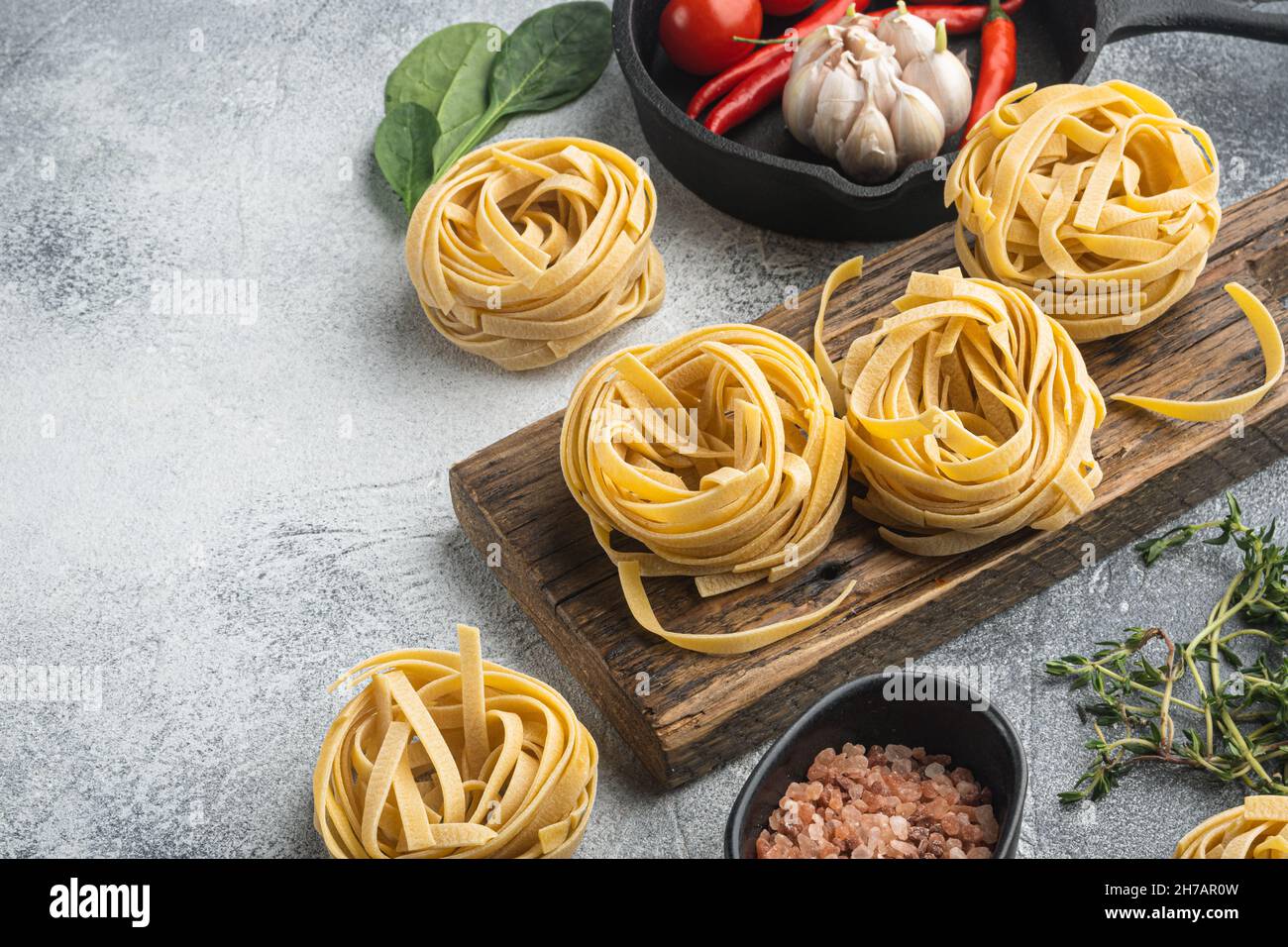 Fettuccine Tagliatelle pasta Italian food ingredients set, on gray ...