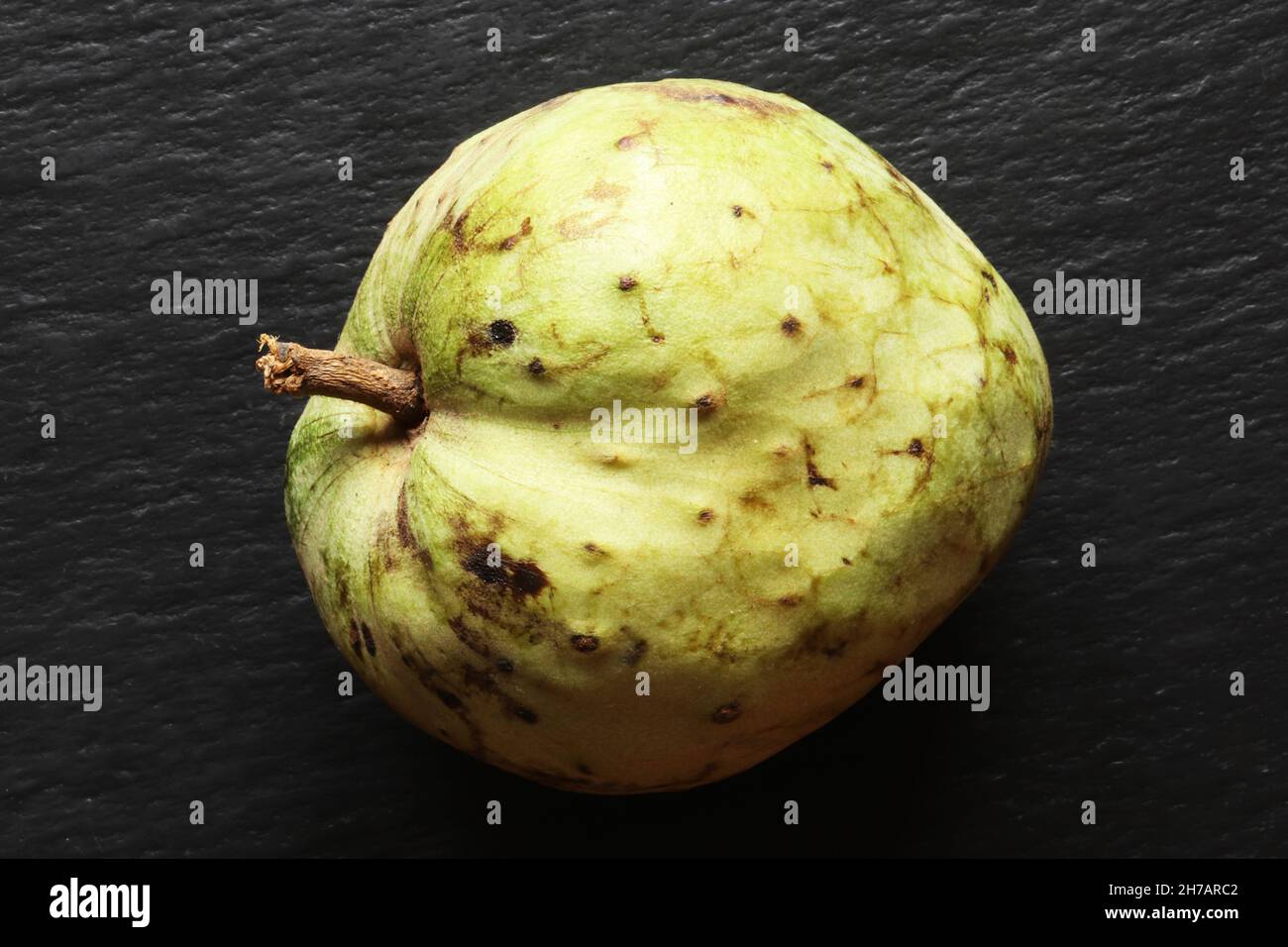 A top view of a whole cherimoya fruit Stock Photo - Alamy
