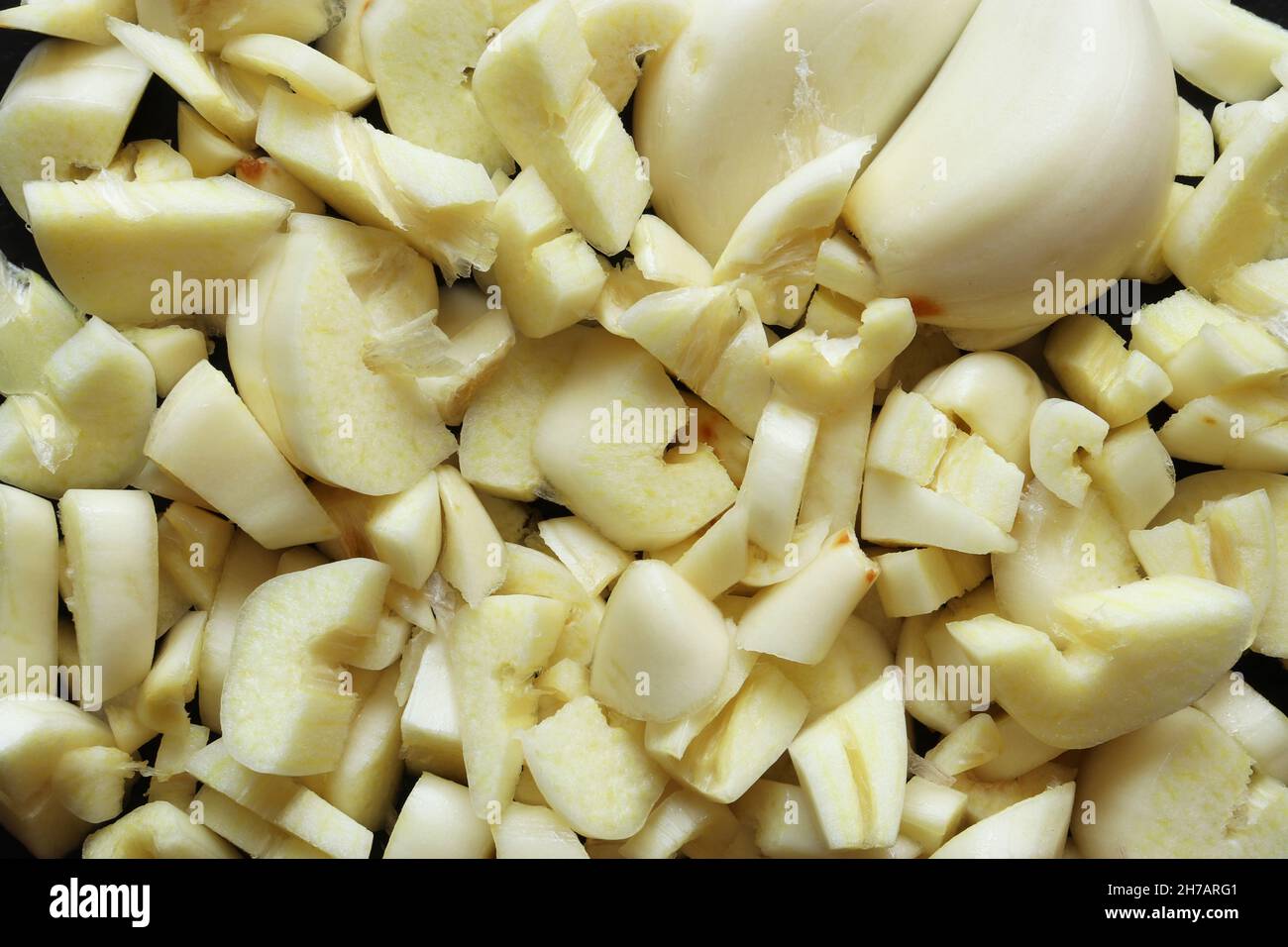 A top view of coarsely chopped garlic Stock Photo - Alamy