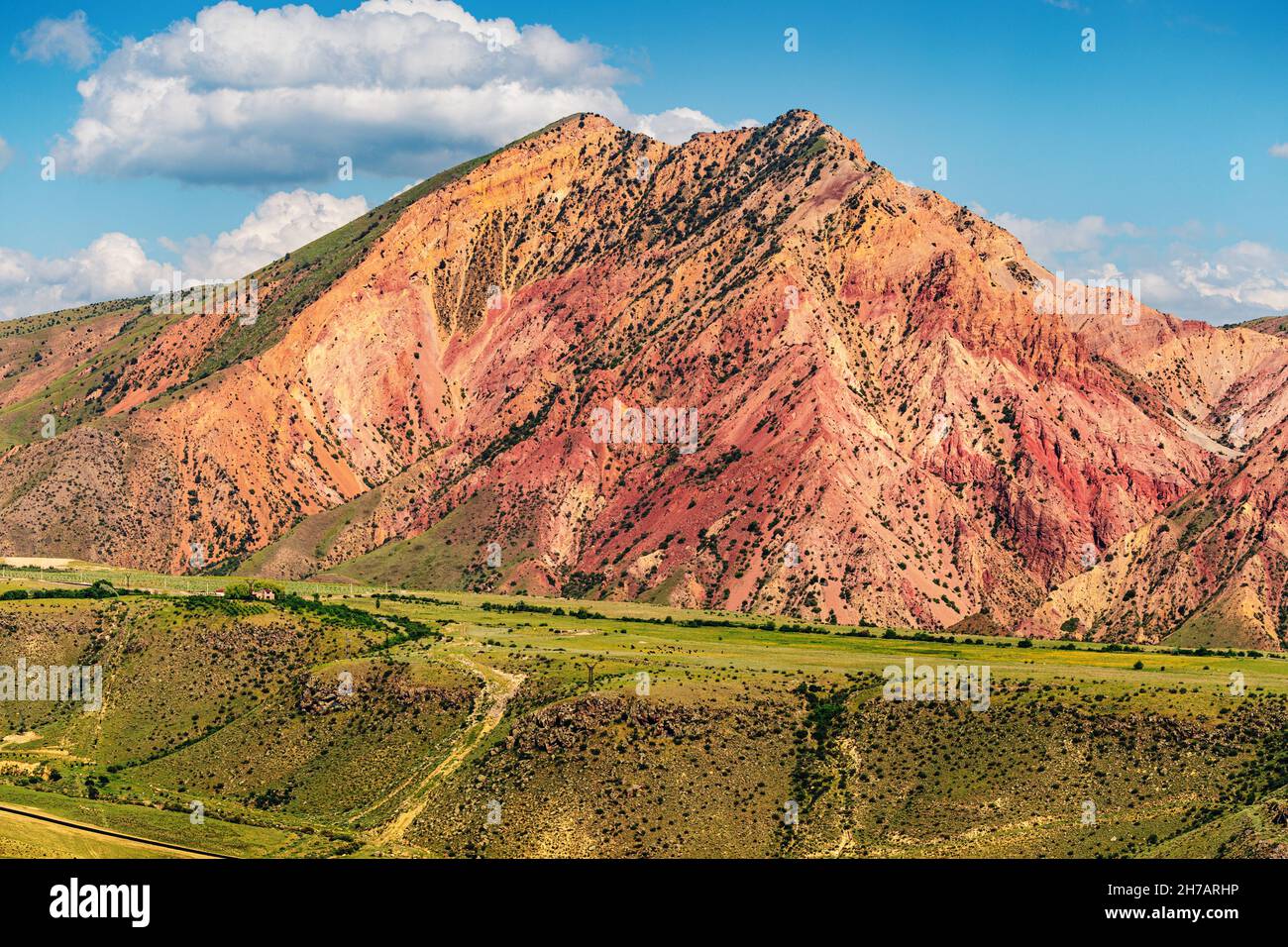 Red rocks with outcrops of geological ferro-magnetic rocks and other ...