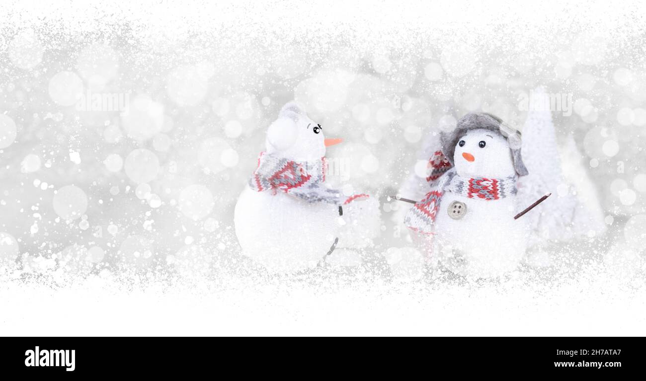 Christmas Greeting Card. Two Cute Snowmen on Winter Holiday Background ...