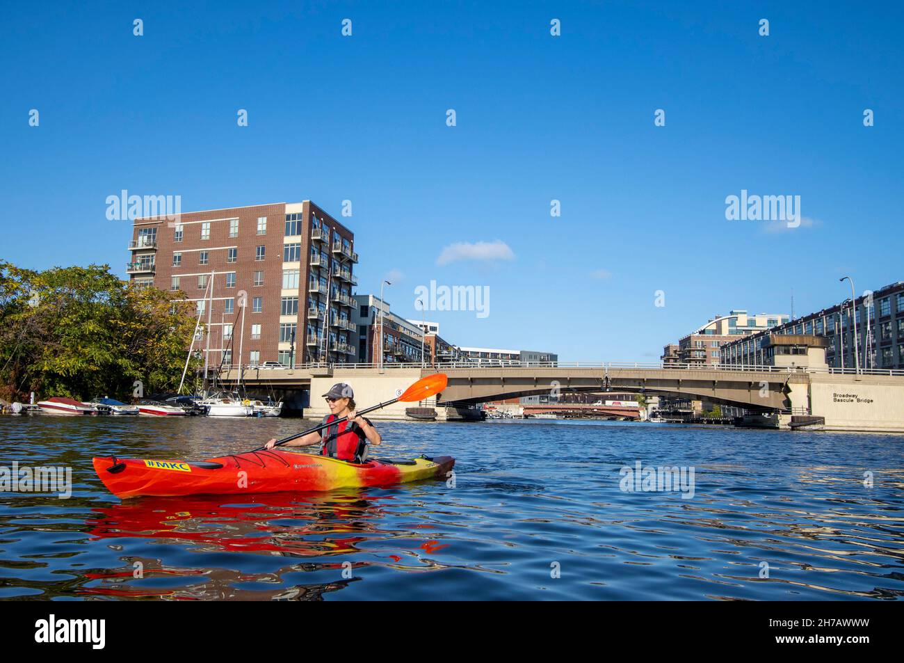 Woman kayaking on river city hi-res stock photography and images - Alamy