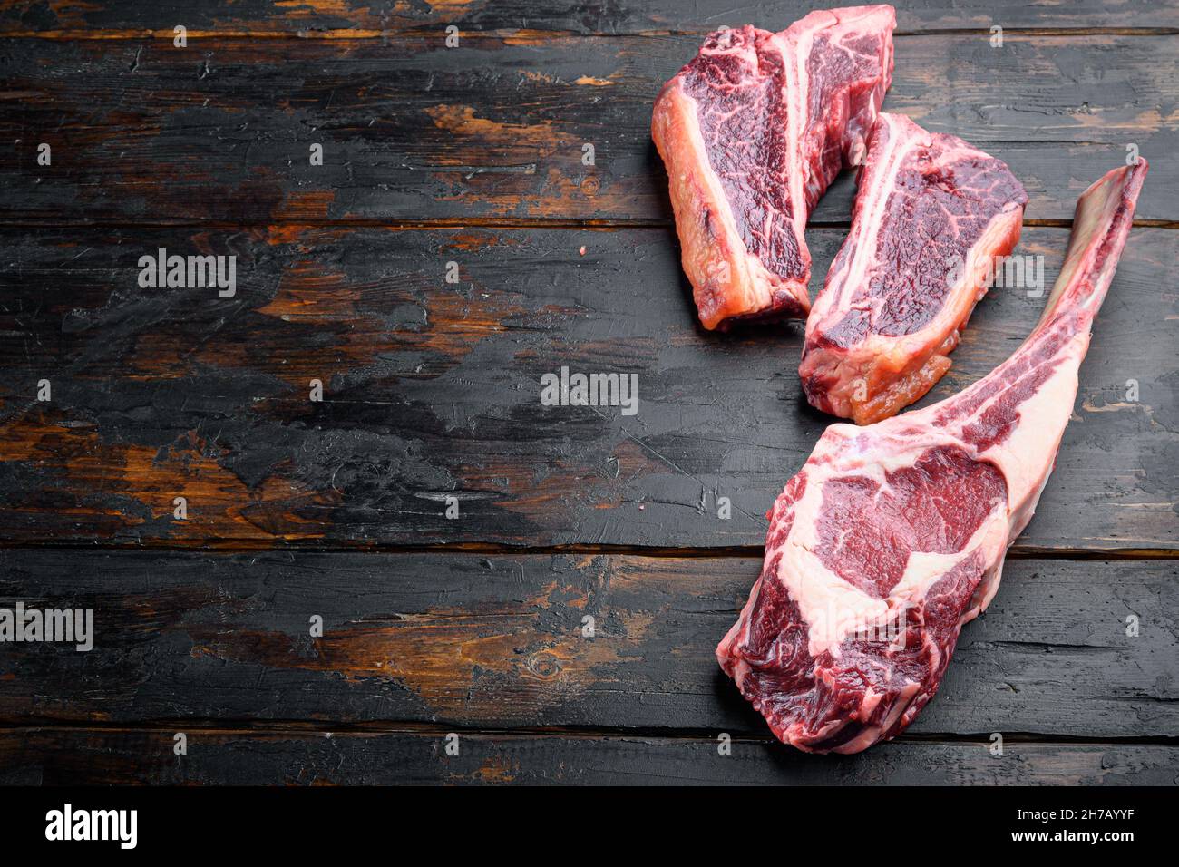 Dry aged raw beef meat set, tomahawk, t bone or porterhouse and club ...