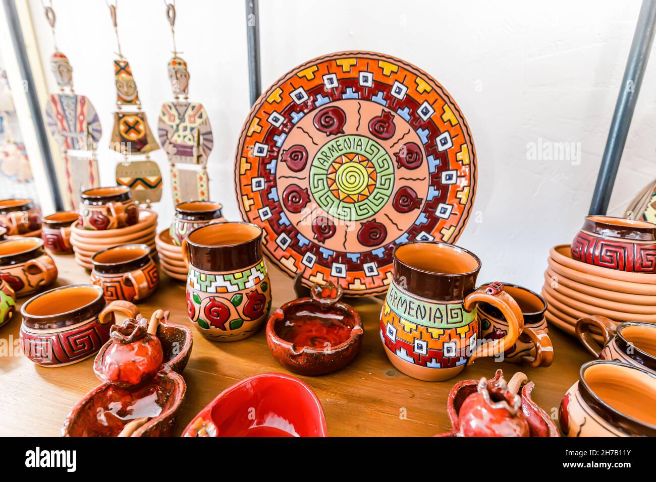 Pottery items are offered for sale with national and folklore patterns ...