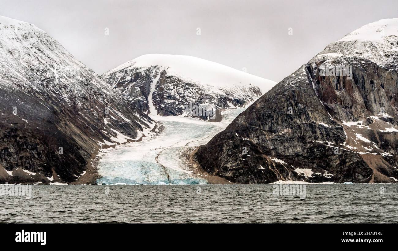 Renland icefield and glacier with medial moraine, O Fjord, Scoresby ...