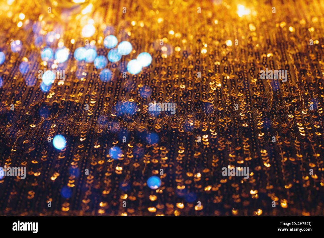 Abstract luxury golden background with sequins sequins. Template for ...