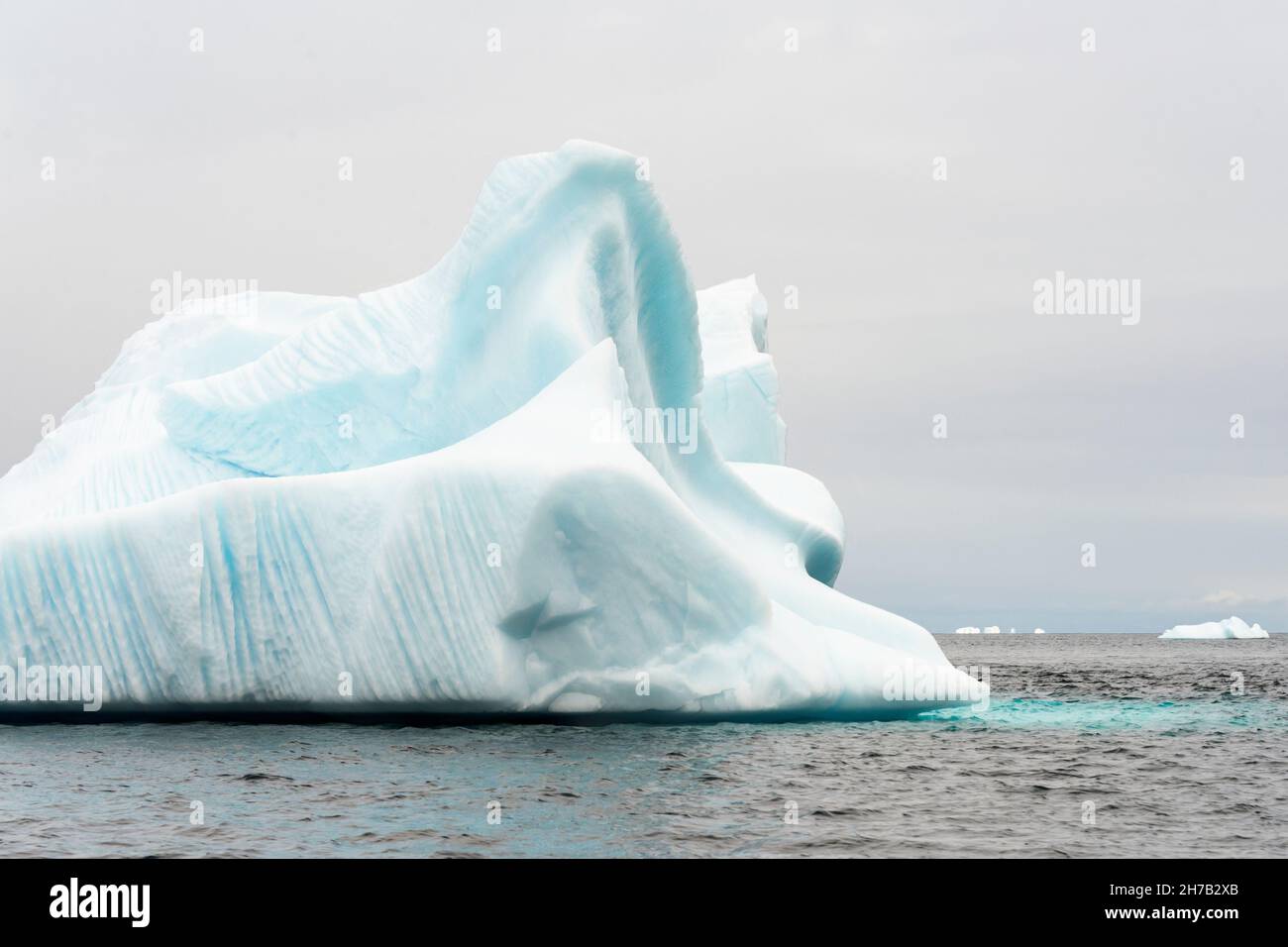 Eroded blue iceberg hi-res stock photography and images - Alamy