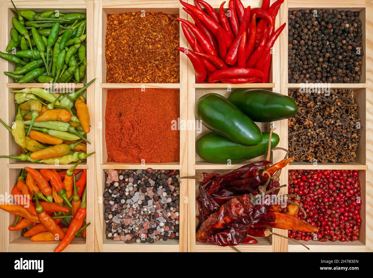 The set of several types of peppers in wooden boxes Stock Photo - Alamy