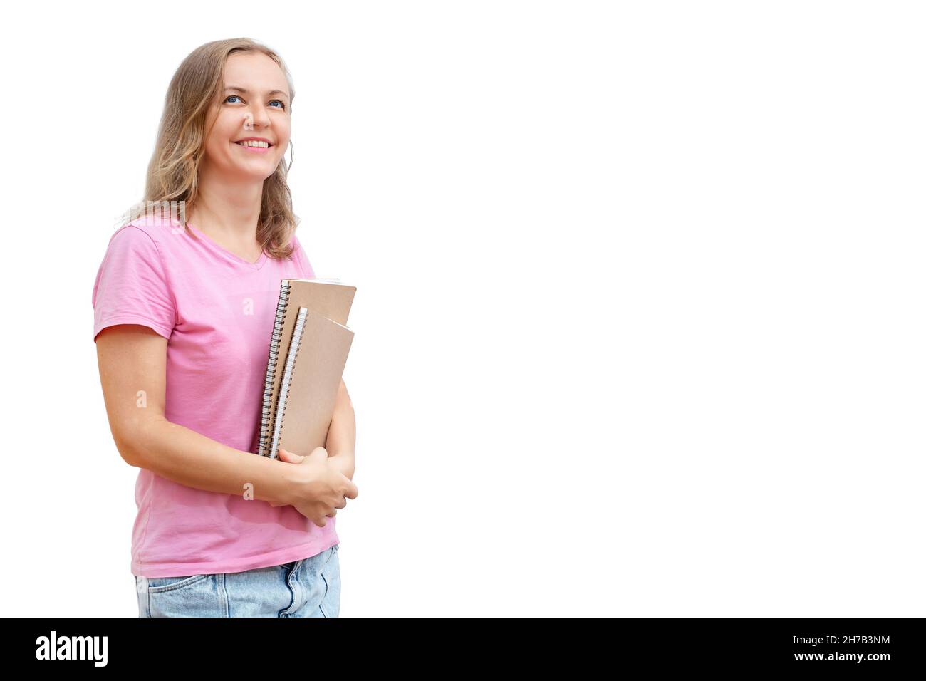 Portrait of woman student with notebooks isolated on white background ...