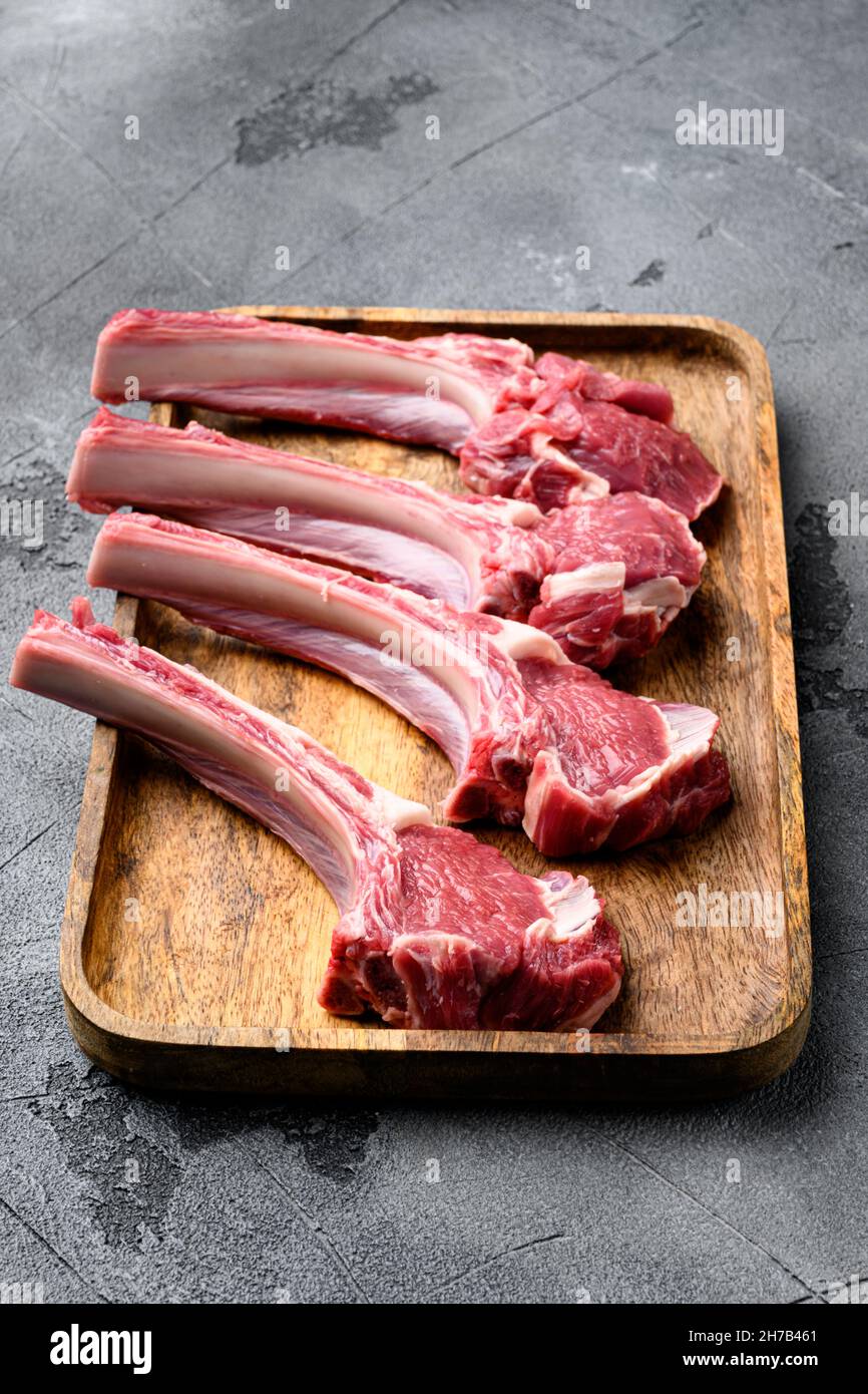 Raw lamb chops or mutton cuts set, on gray stone table background Stock ...