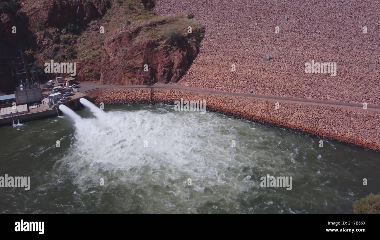 aerial ascending shot of lake argyle dam wall and water outlet Stock ...