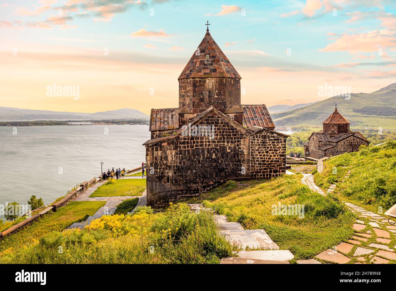 View of the symbol of tourist Armenia - Sevanavank Monastery on the peninsula overlooking Lake ...