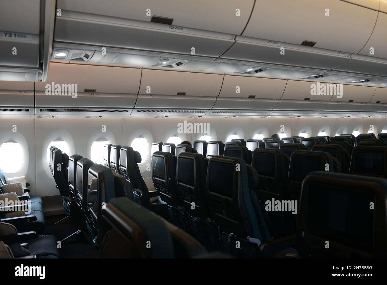 An empty airplane flying during the Covid-19 pandemic Stock Photo - Alamy