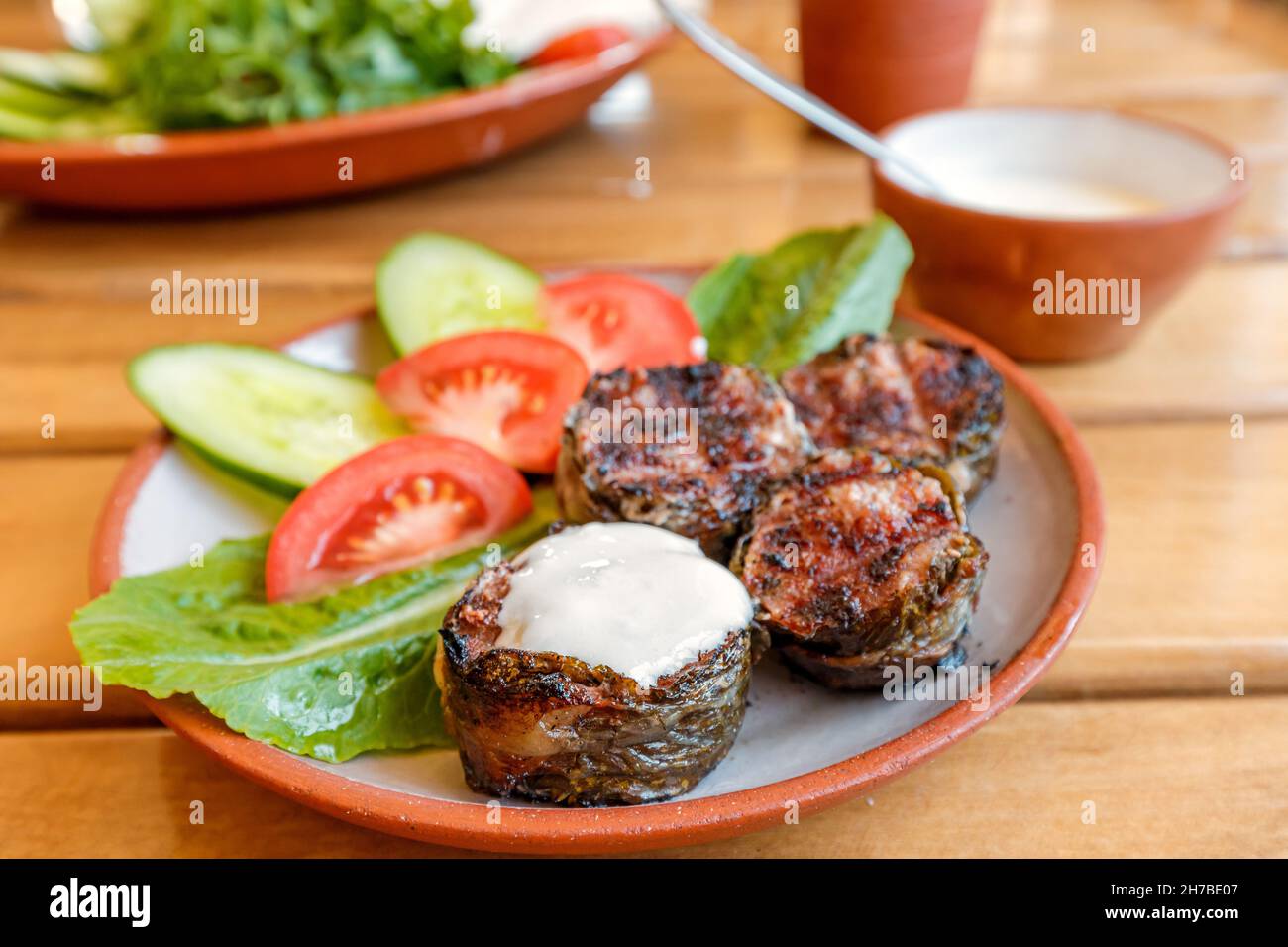 Armenian hearty lunch. On the table is a dolma of shish kebab with ...