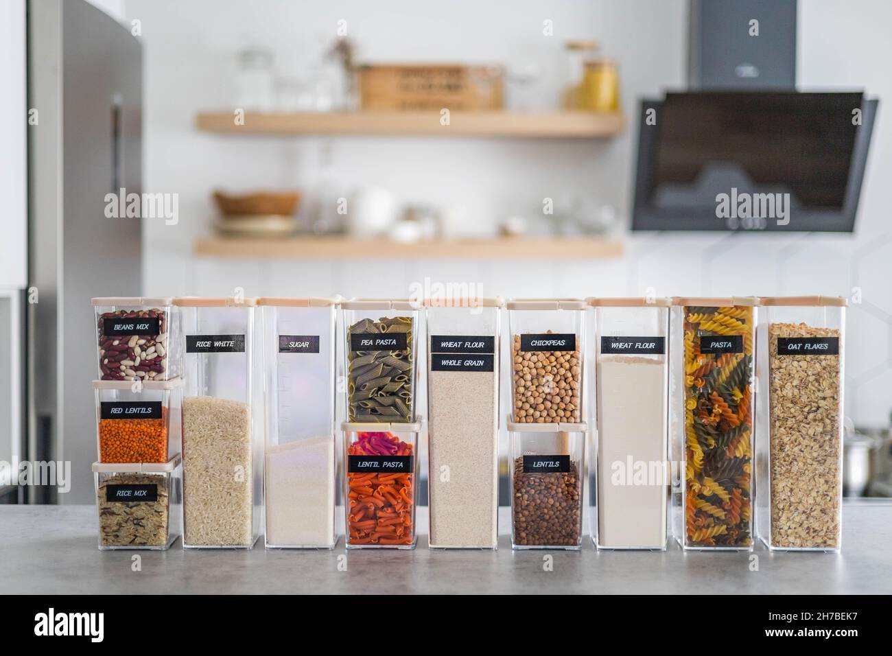 Kitchen storage organization use plastic case. Placing and sorting food ...