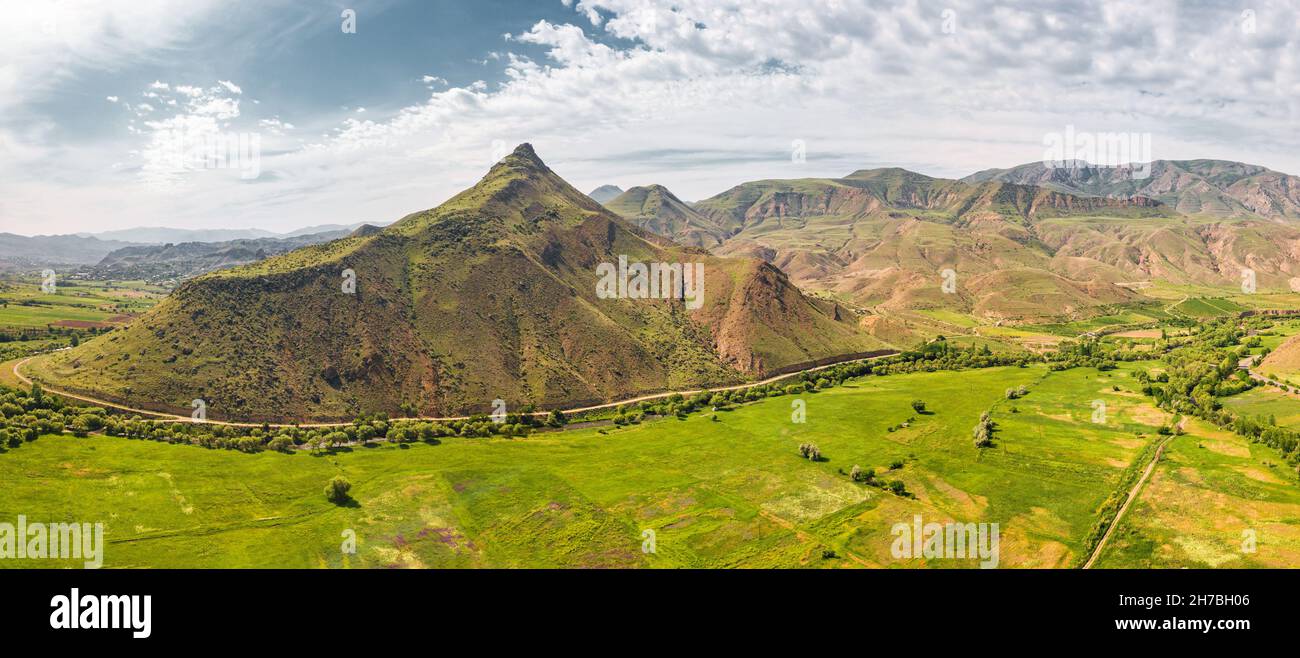 Aerial drone view over scenic peak mountain or ancient stratovolcano in ...